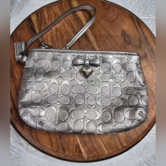 Coach | Bags | Coach Monogram Logo Metallic Silver Bow With Heart ...